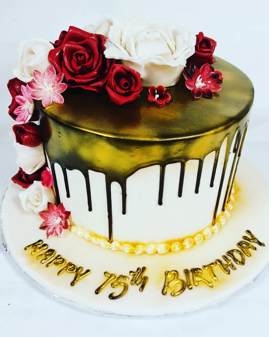 Golden drip cake OC32 – Flurys